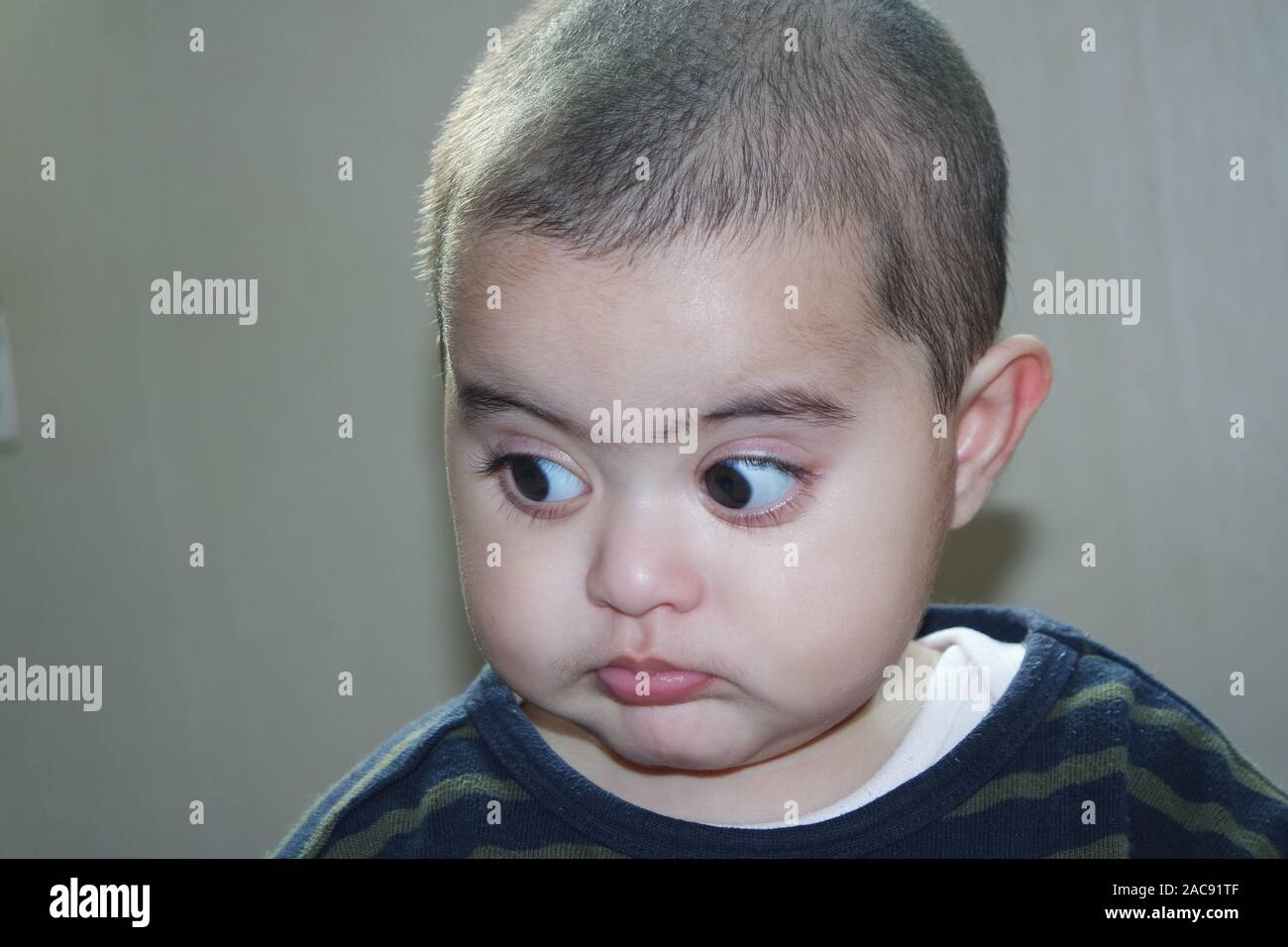 Boy child infant girl very big eyes hi-res stock photography and images ...