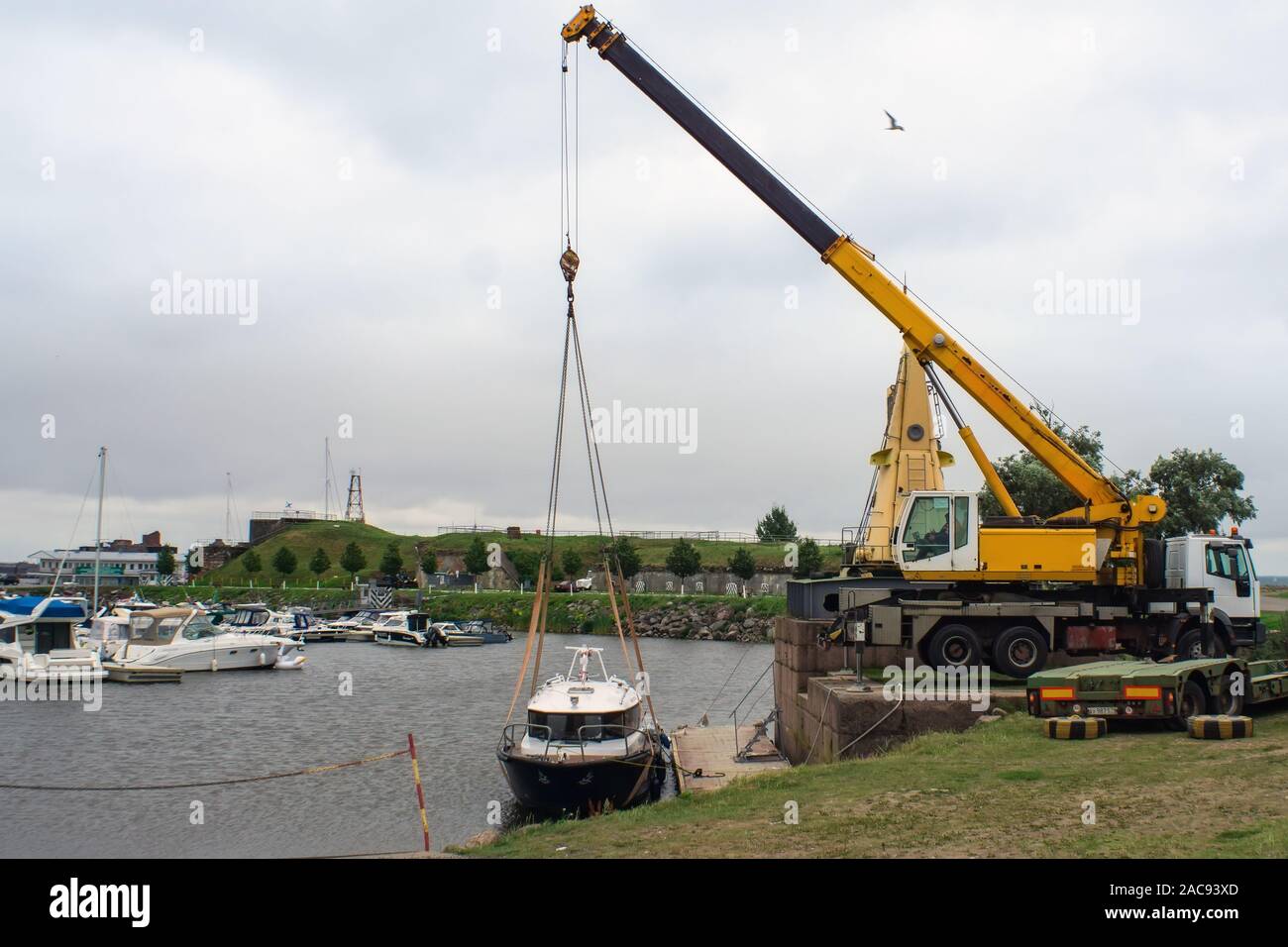 Kronstadt, Russia, July 29: crane repair boats, pulls the boat, the ...