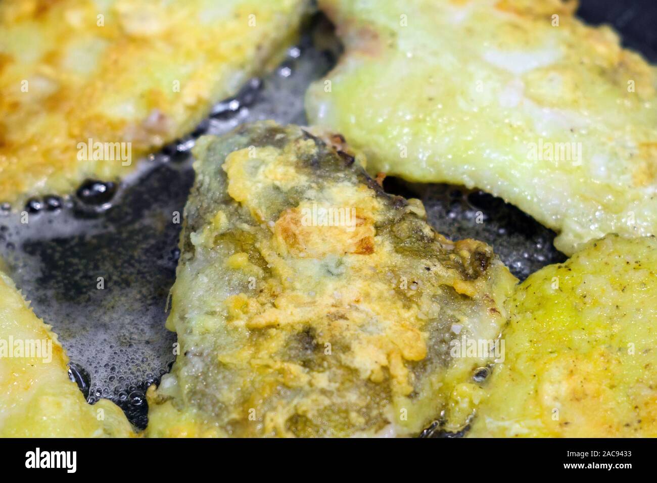 Fried flatfish, flounder baked in a pan Stock Photo - Alamy