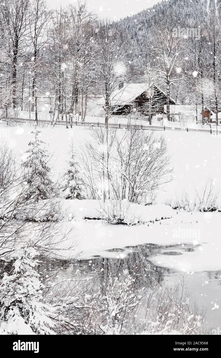 Winter Snowy Bavarian Alpine landscape with snow covered field, house ...