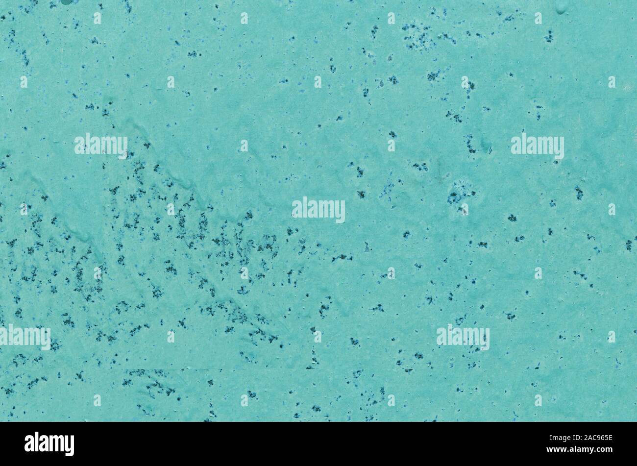 Metal sheet with spots of rust, painted green. Abstract texture. Close ...