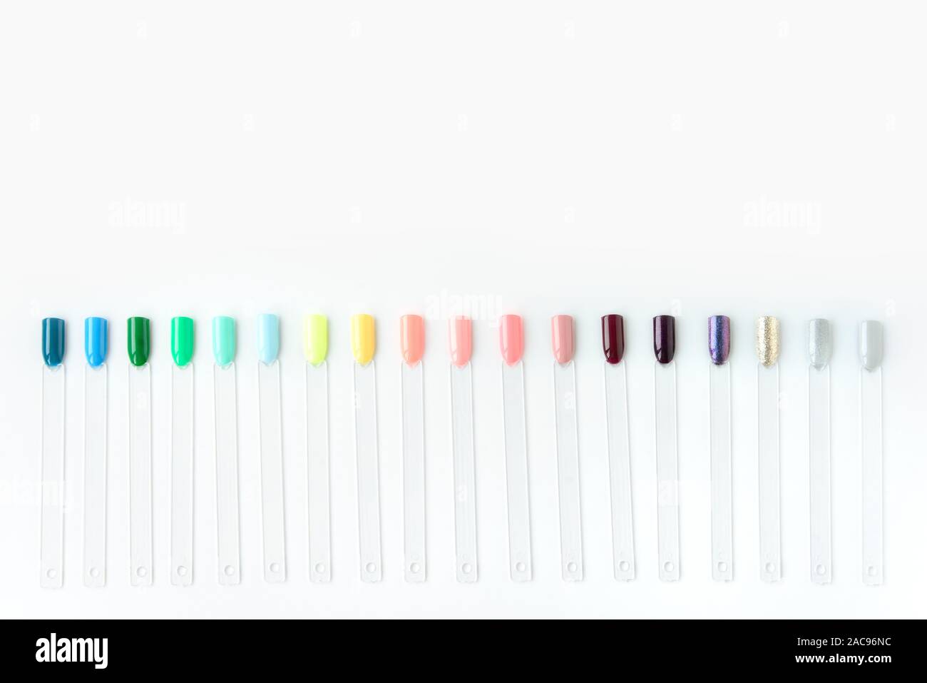 Nail polish samples in different bright colors. Colorful nail lacquer ...