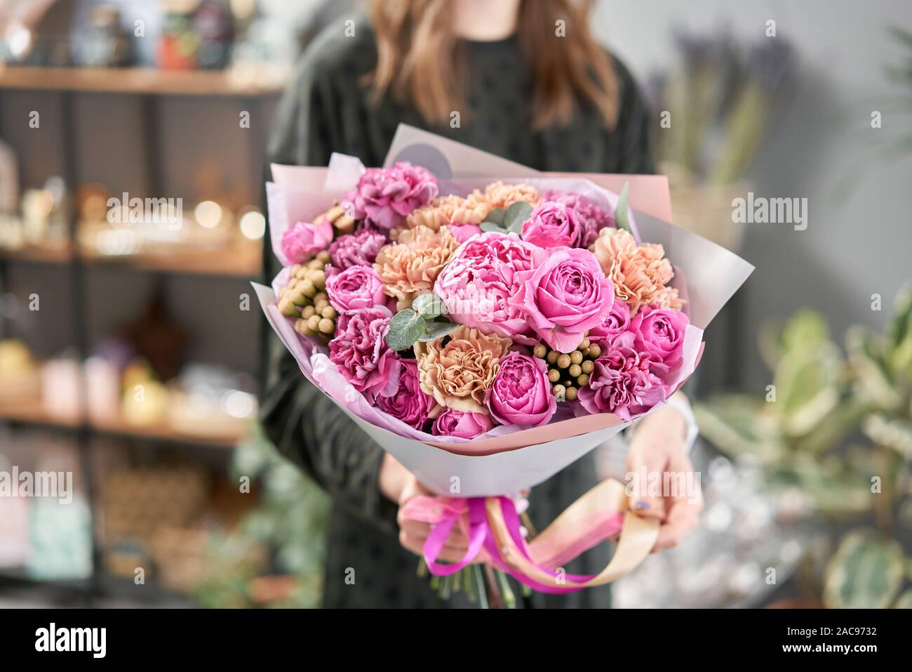 Pink peonies, Sarah Bernhardt and different flowers. European floral ...