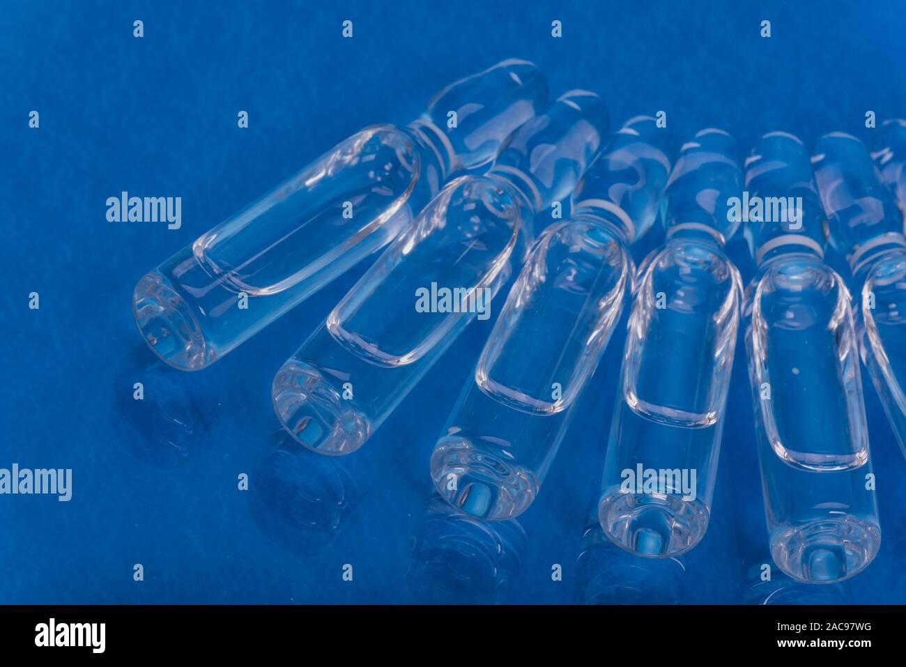 Glass medical ampoule vial for injection. Medicine is liquid sodium ...