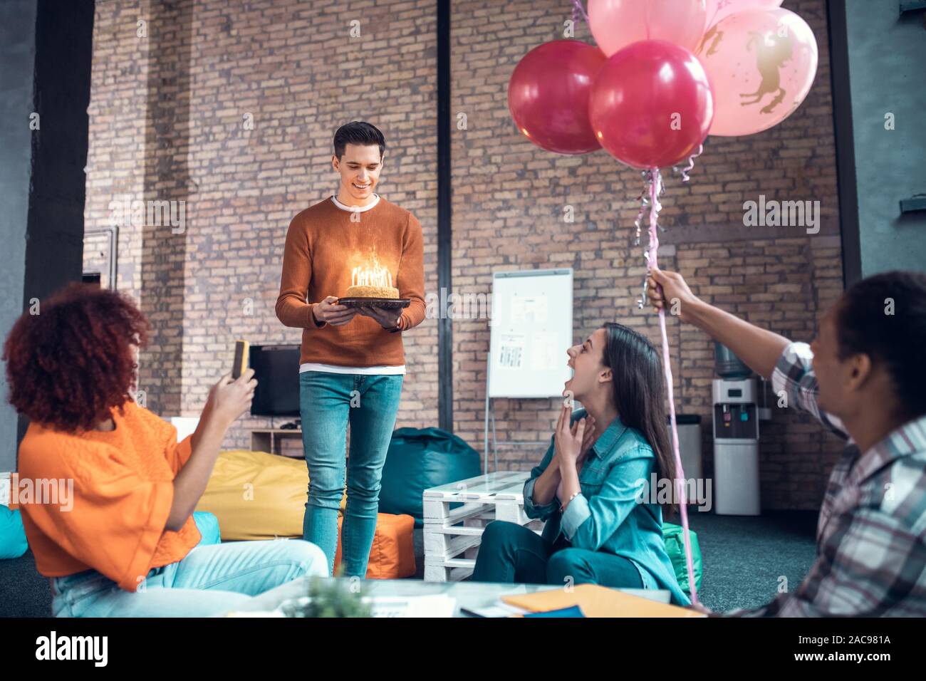 Beautiful woman congratulating boyfriend on hi-res stock photography ...