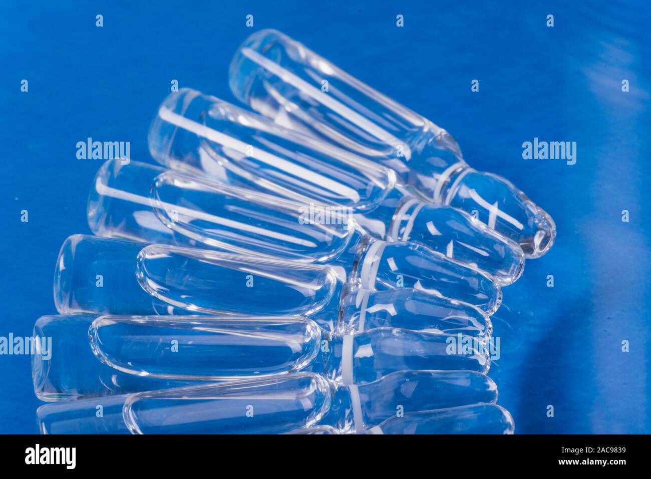 Glass medical ampoule vial for injection. Medicine is liquid sodium ...