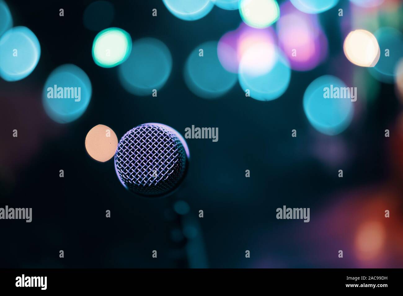 Microphone on colorful background. Stage and retro microphone Stock ...