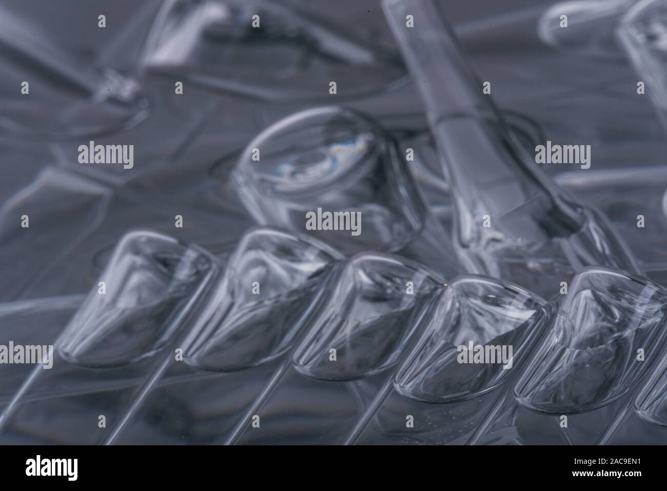 Glass medical ampoule vial for injection. Medicine is liquid sodium ...