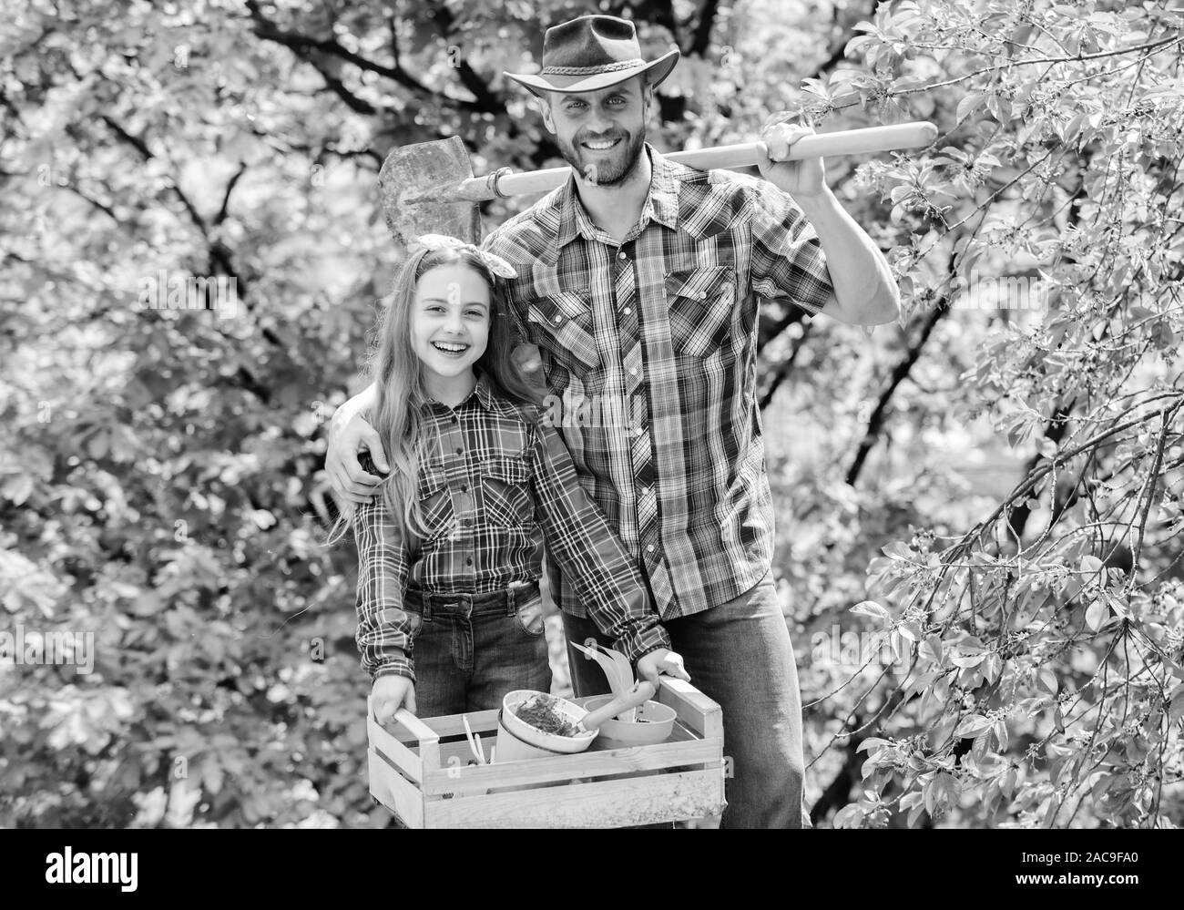 father and daughter on ranch. little girl and happy man dad. earth day ...