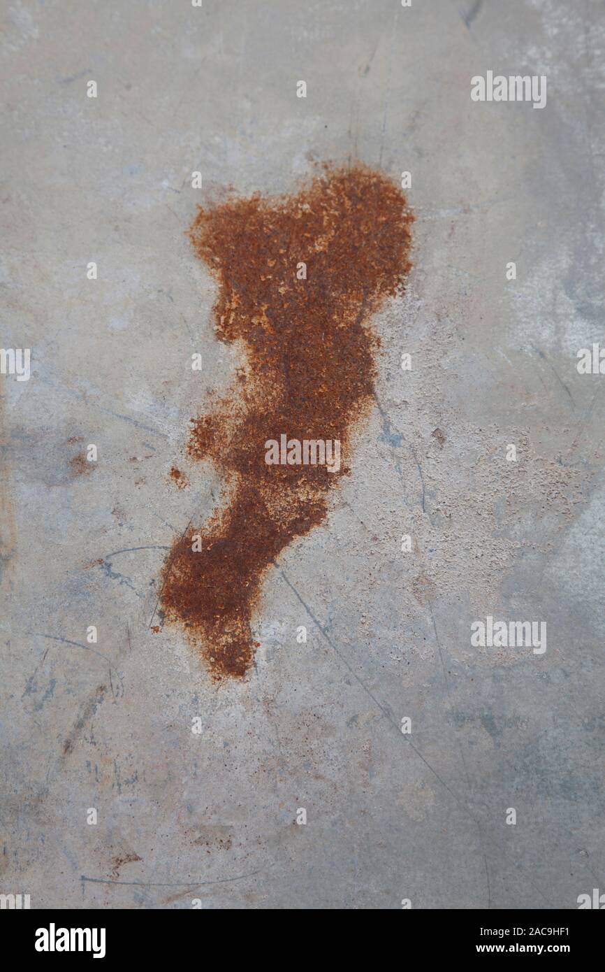 rusty spots on a metallic decaying colored background Stock Photo - Alamy