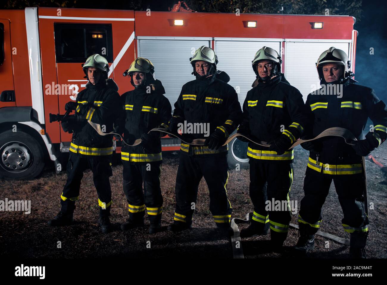Fire department in the field during a fire emergency situation Stock ...