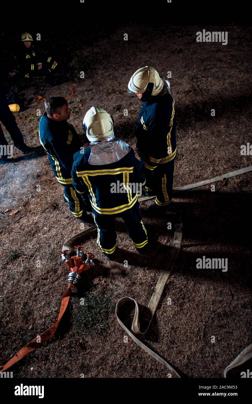 Fire station crew responding to fire emergency situation Stock Photo ...