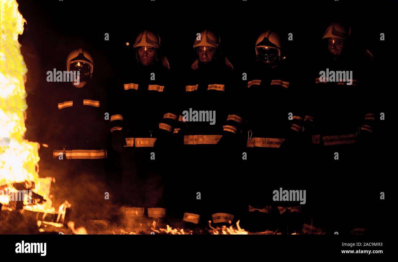 Silhouette firefighter in front fire hi-res stock photography and ...