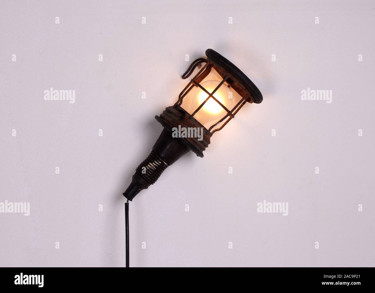 Old vintage light from the 70s, hanging on wall, isolated Stock Photo ...