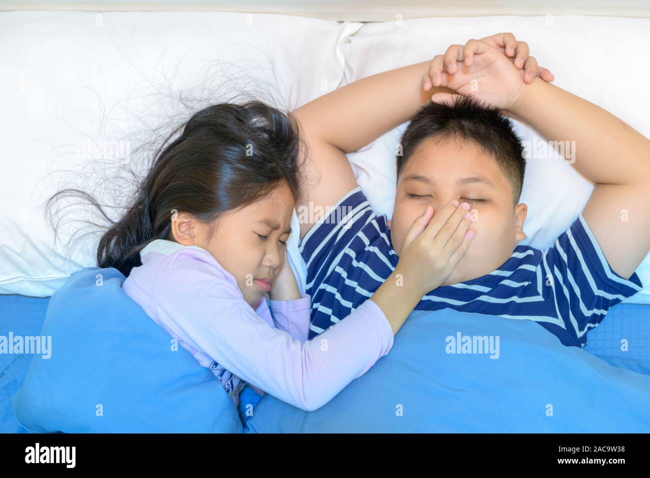 Brothers annoying their sister hi-res stock photography and images - Alamy