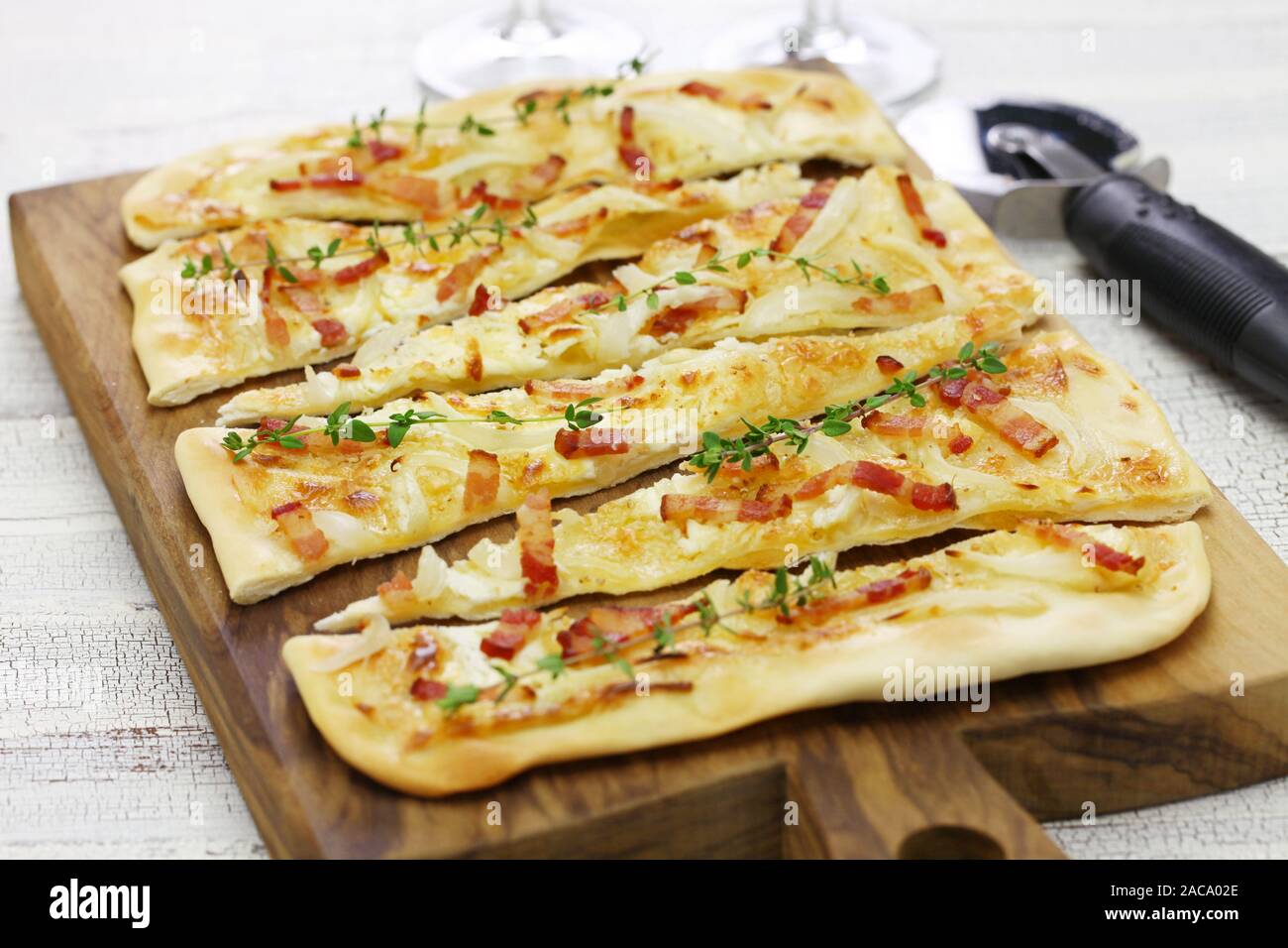 traditional alsatian pie, tart flambe, flammekueche, bacon onion cream ...