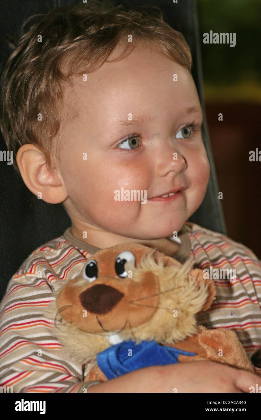 Cuddly toy child hi-res stock photography and images - Alamy