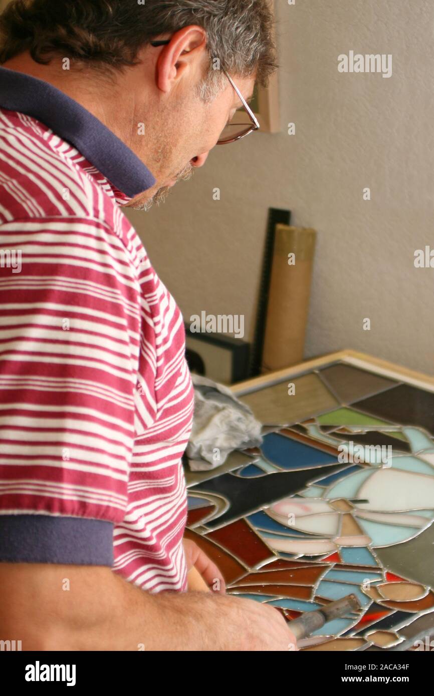 Glass artists at work Stock Photo - Alamy