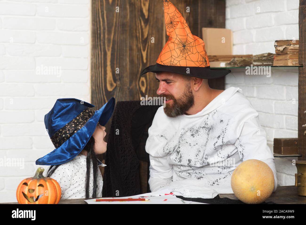 Witcher and little magician make Halloween decor. Halloween party and ...