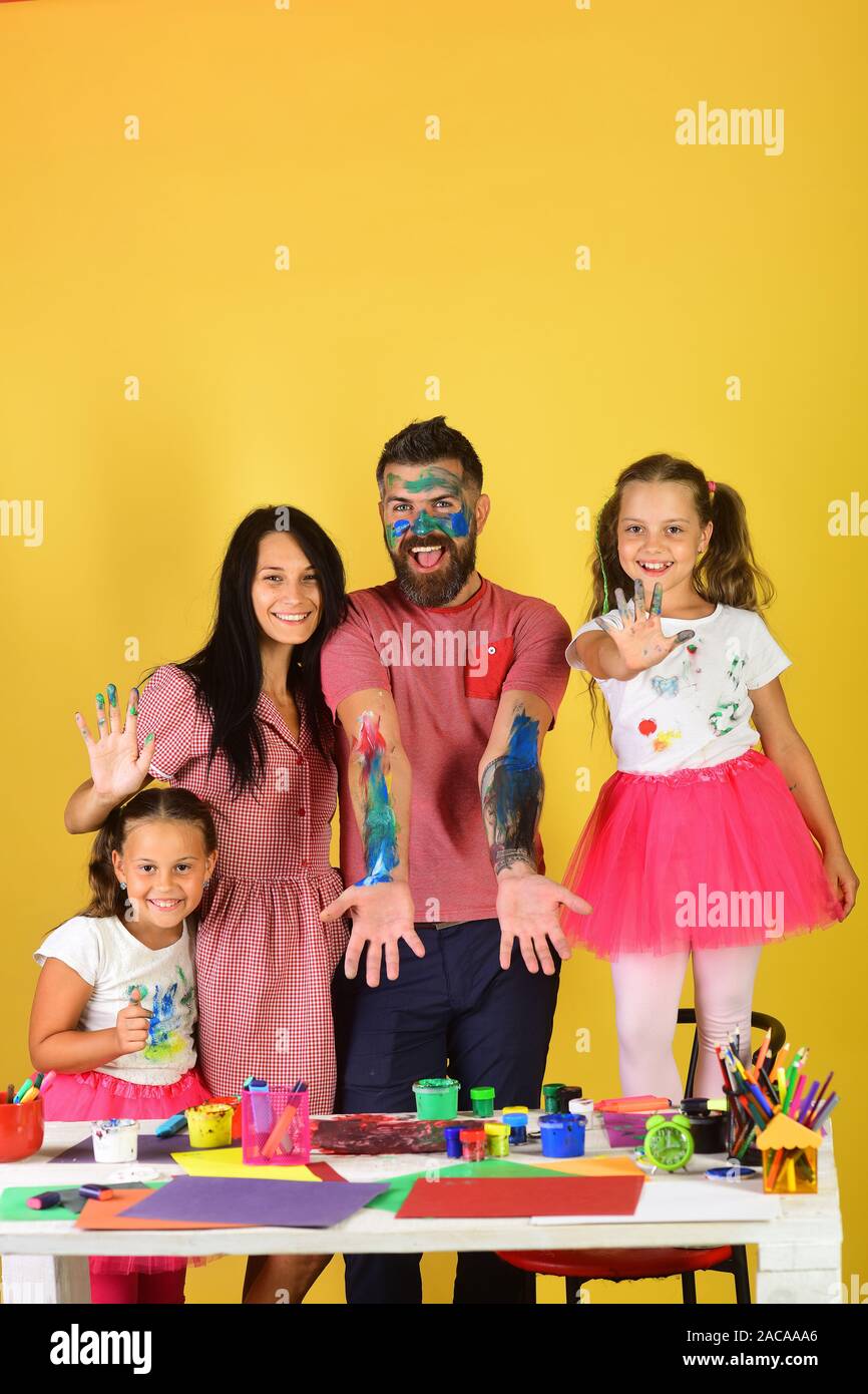 Artists create artwork on guys body. Family leisure time and art ...