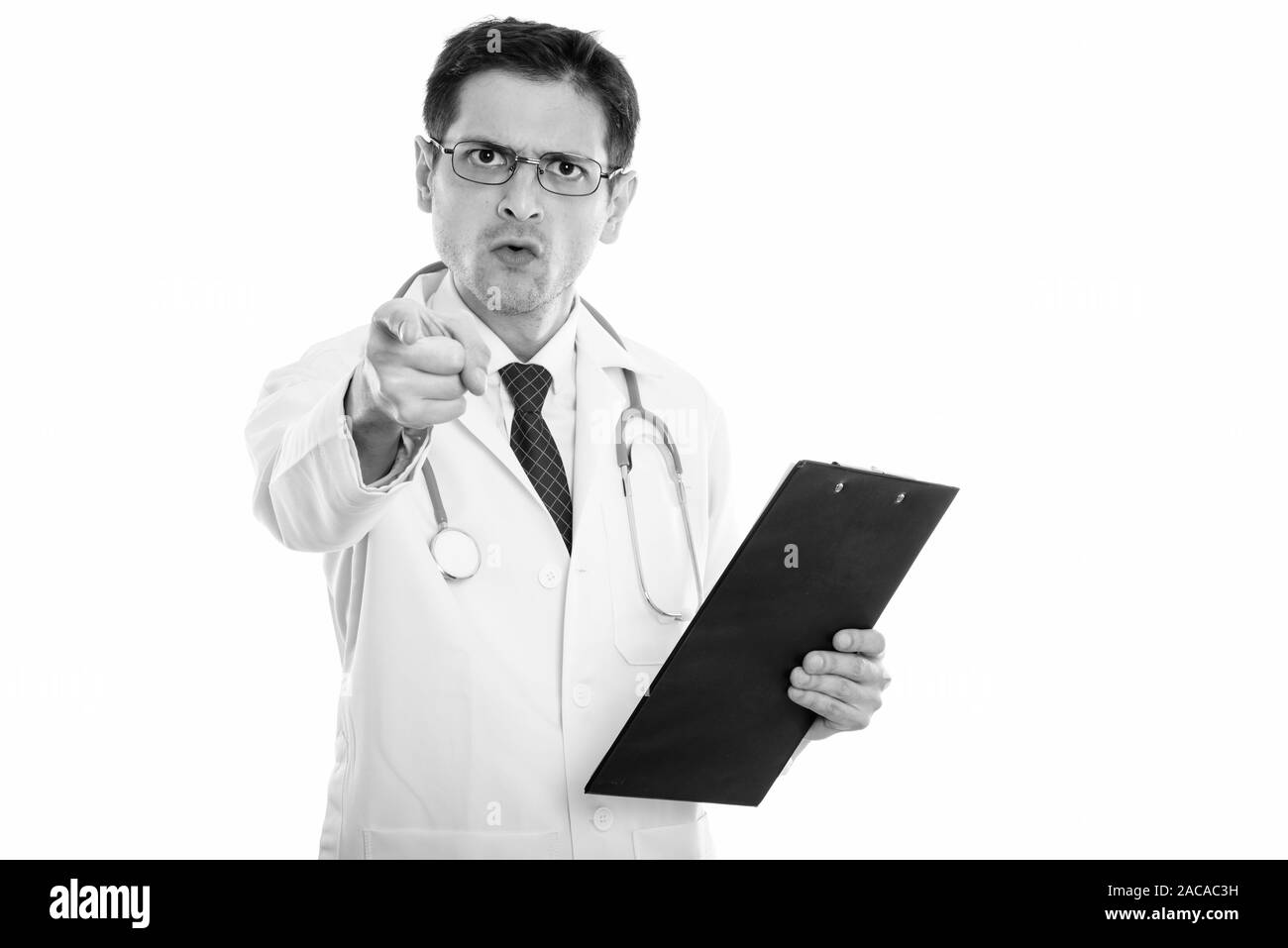 Angry pointing doctor young man hi-res stock photography and images - Alamy