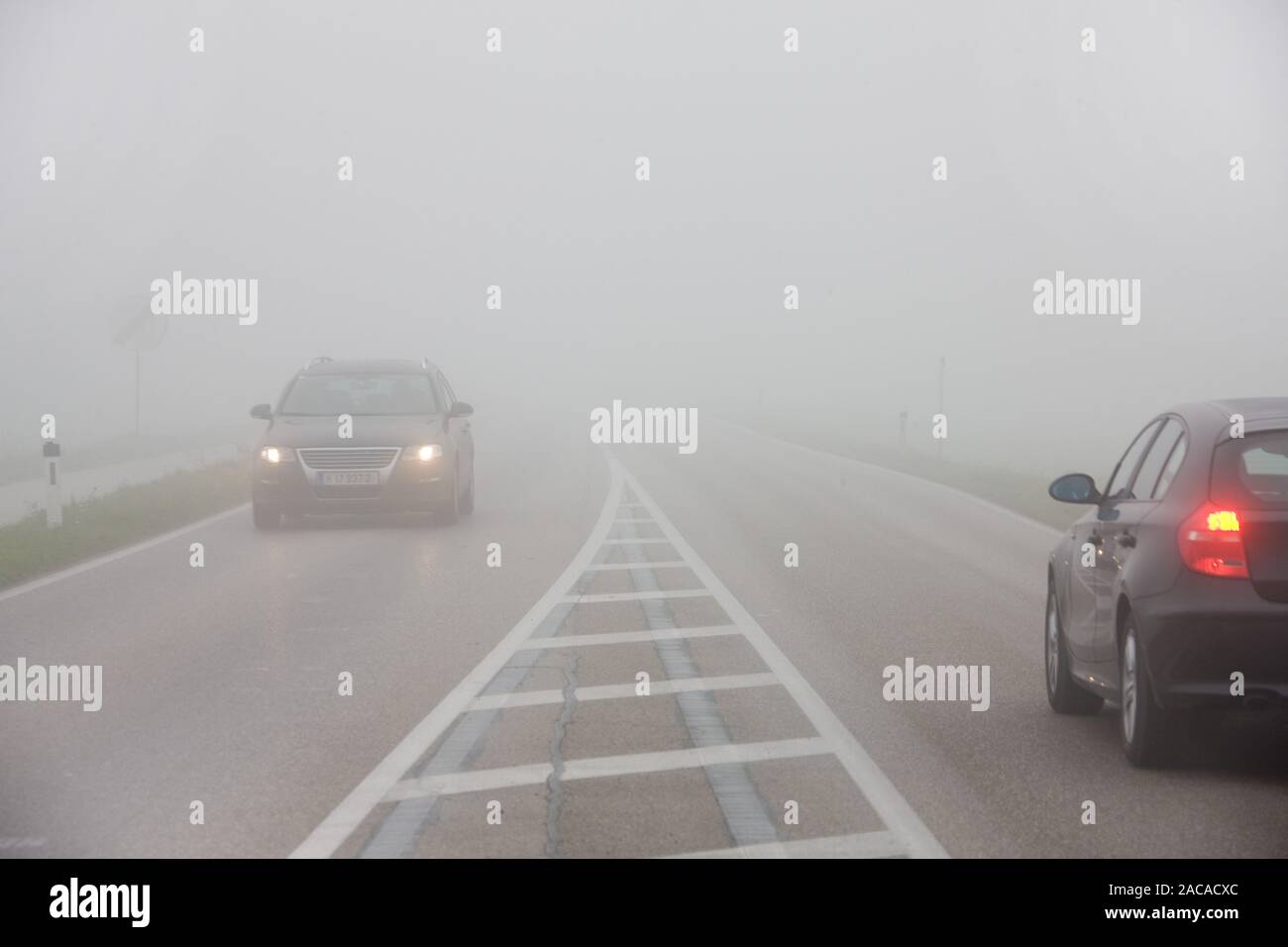 Cars driving in fog hi-res stock photography and images - Alamy