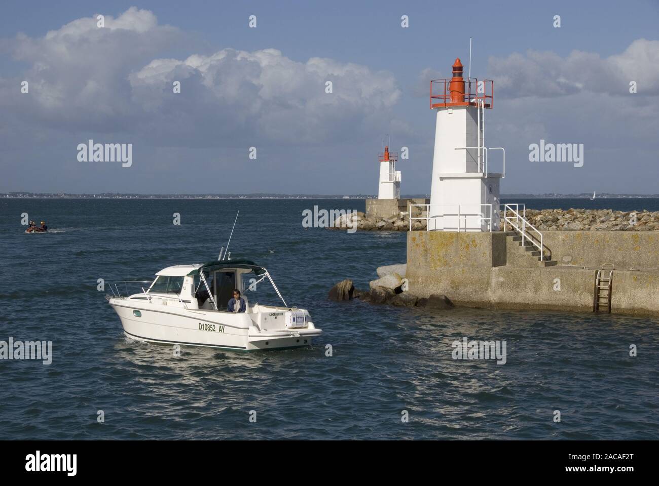 Lighthouse with boat hi-res stock photography and images - Alamy