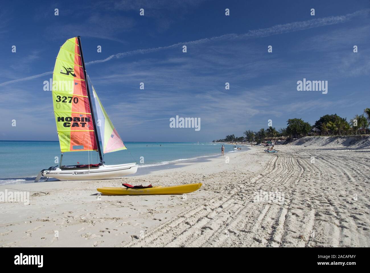 Catamaran and kayak on the beach Stock Photo - Alamy