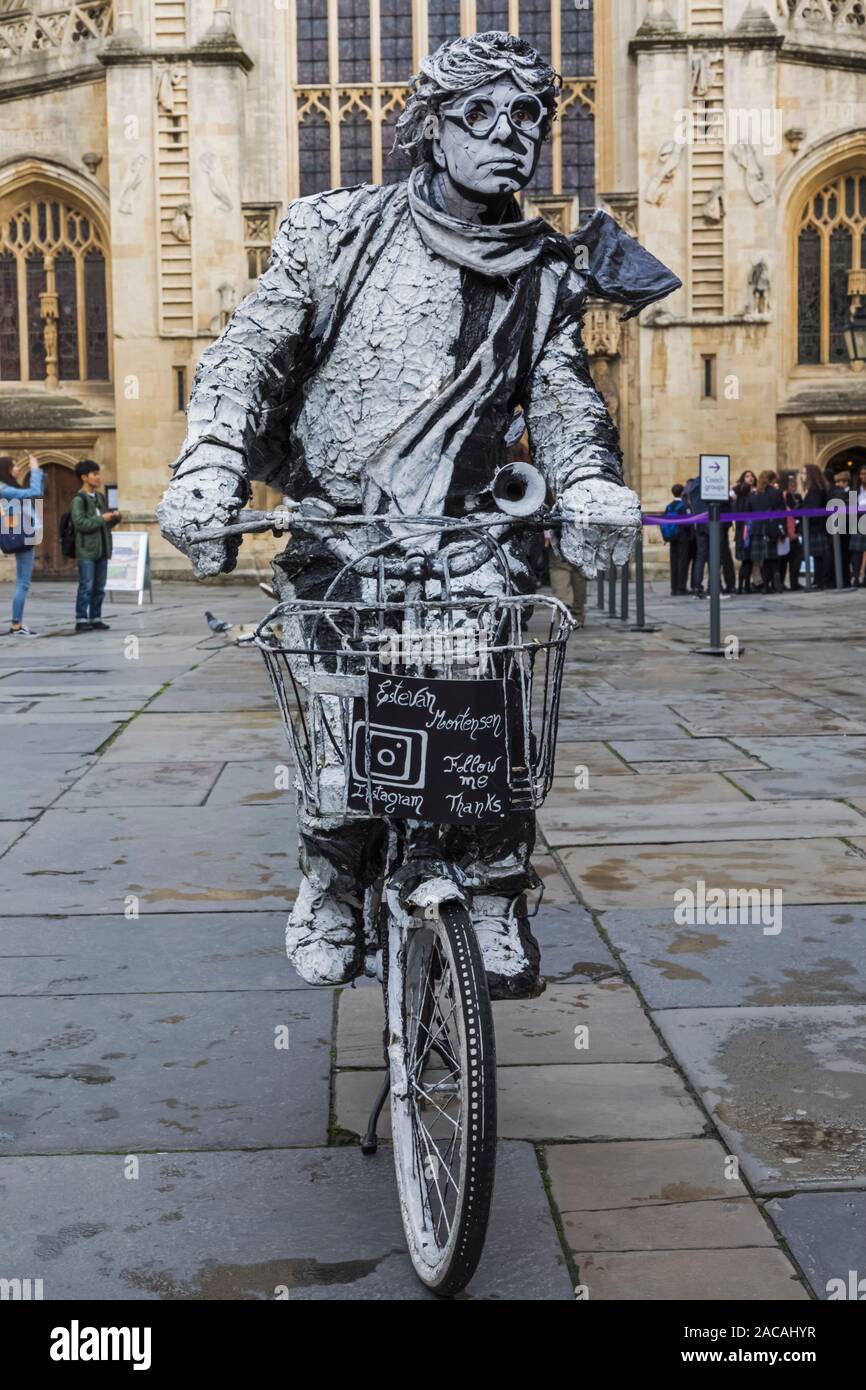 England, Somerset, Bath, Human Statue Sitting on Bicycle Stock Photo ...