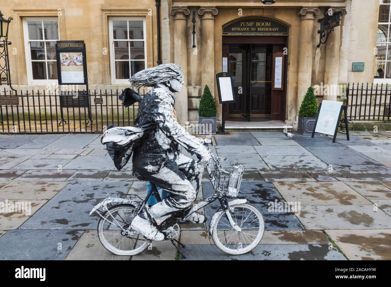 England, Somerset, Bath, Human Statue Sitting on Bicycle Stock Photo ...