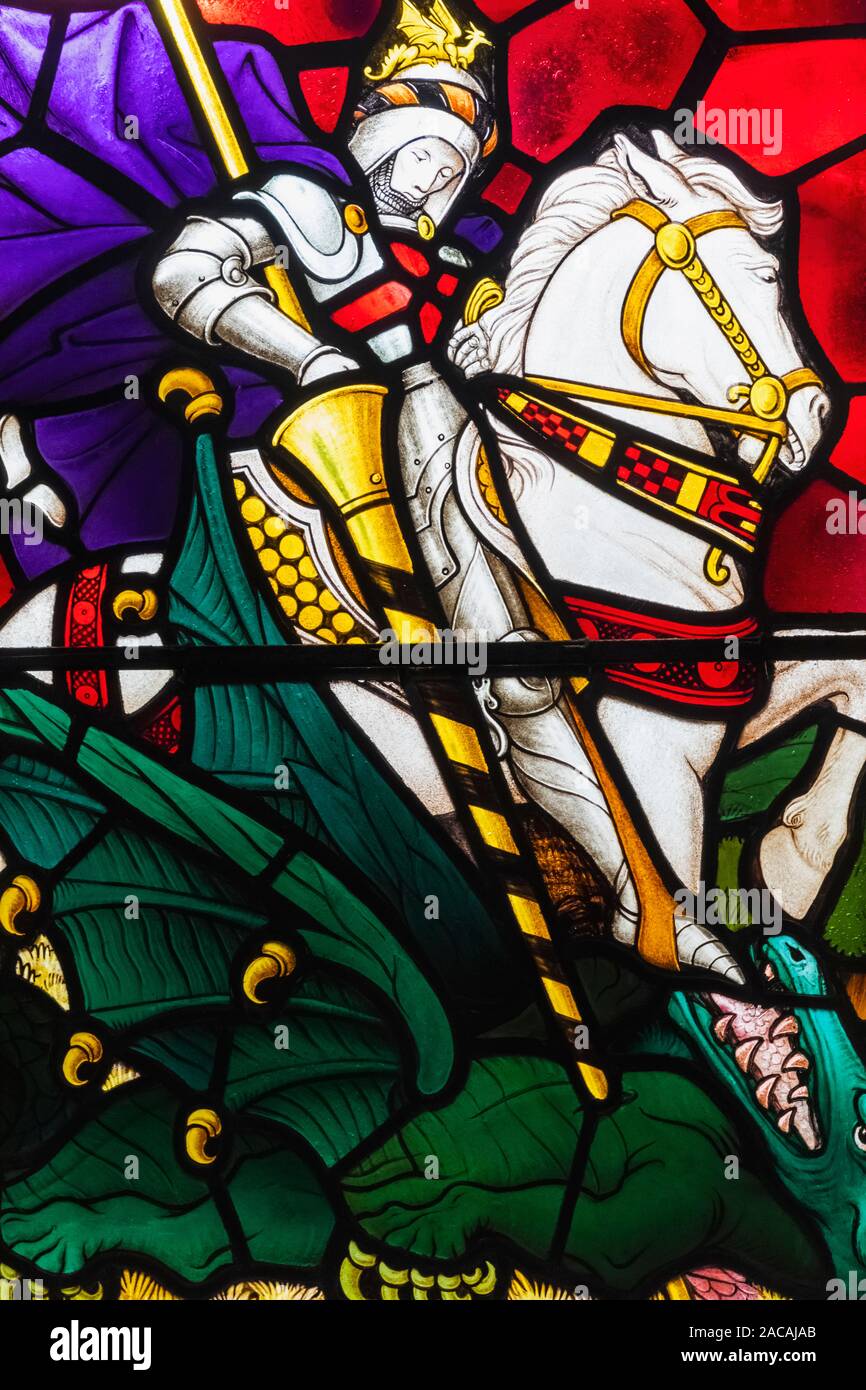 Stained glass window depicting st george slaying the dragon hi-res ...