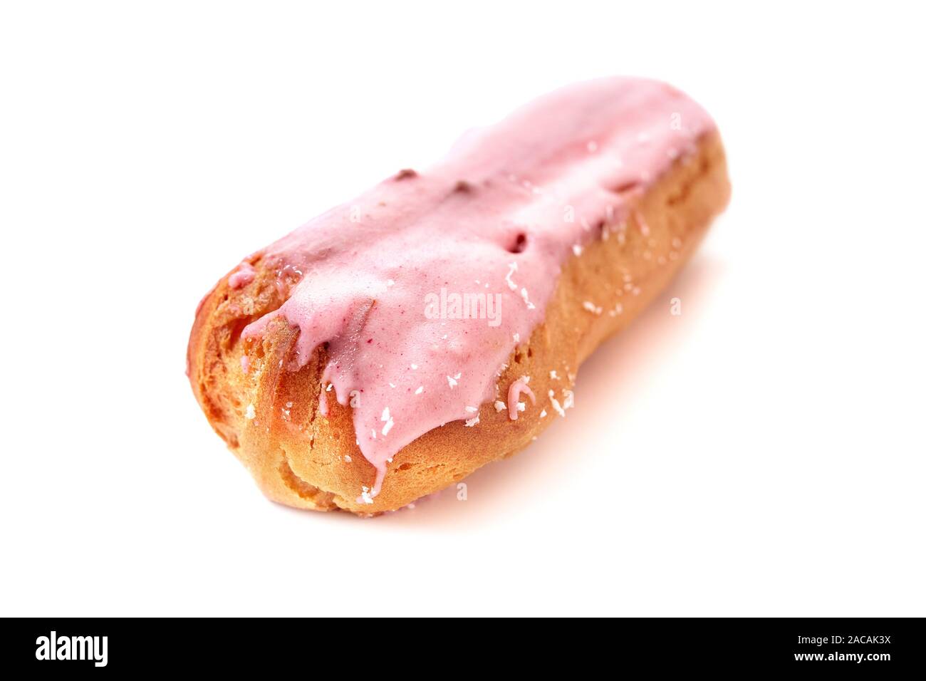 Traditional french dessert.Eclair with custard and icing on white ...