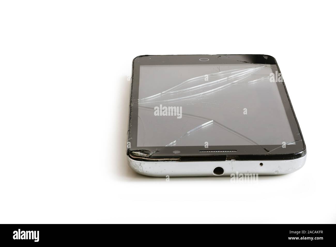 Old phone with broken screen isolated on white background Stock Photo ...