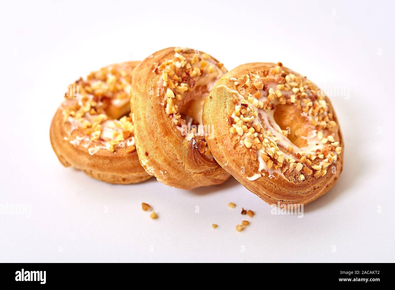 Chocolate and powdered sugar cream puff rings, choux pastry Stock Photo ...