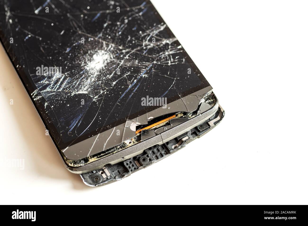 Old phone with broken screen isolated on white background Stock Photo ...