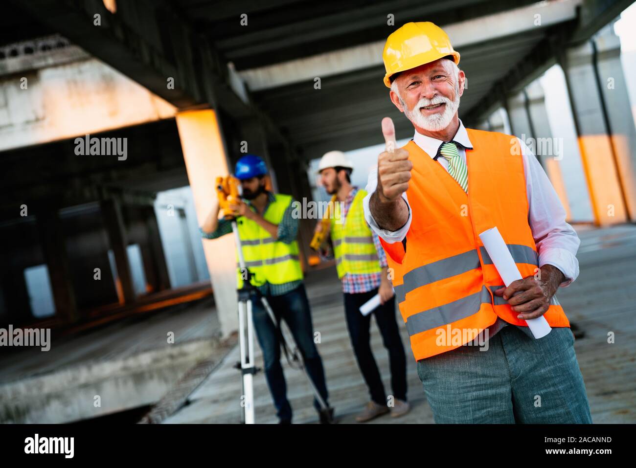 Engineer, contractor, architect teamwork. Construction people talking ...