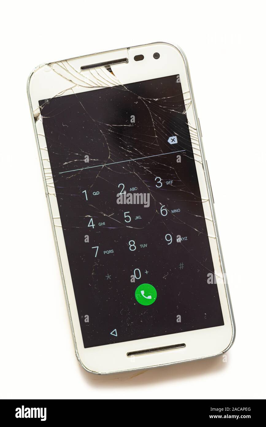 Old phone with broken screen isolated on white background Stock Photo ...