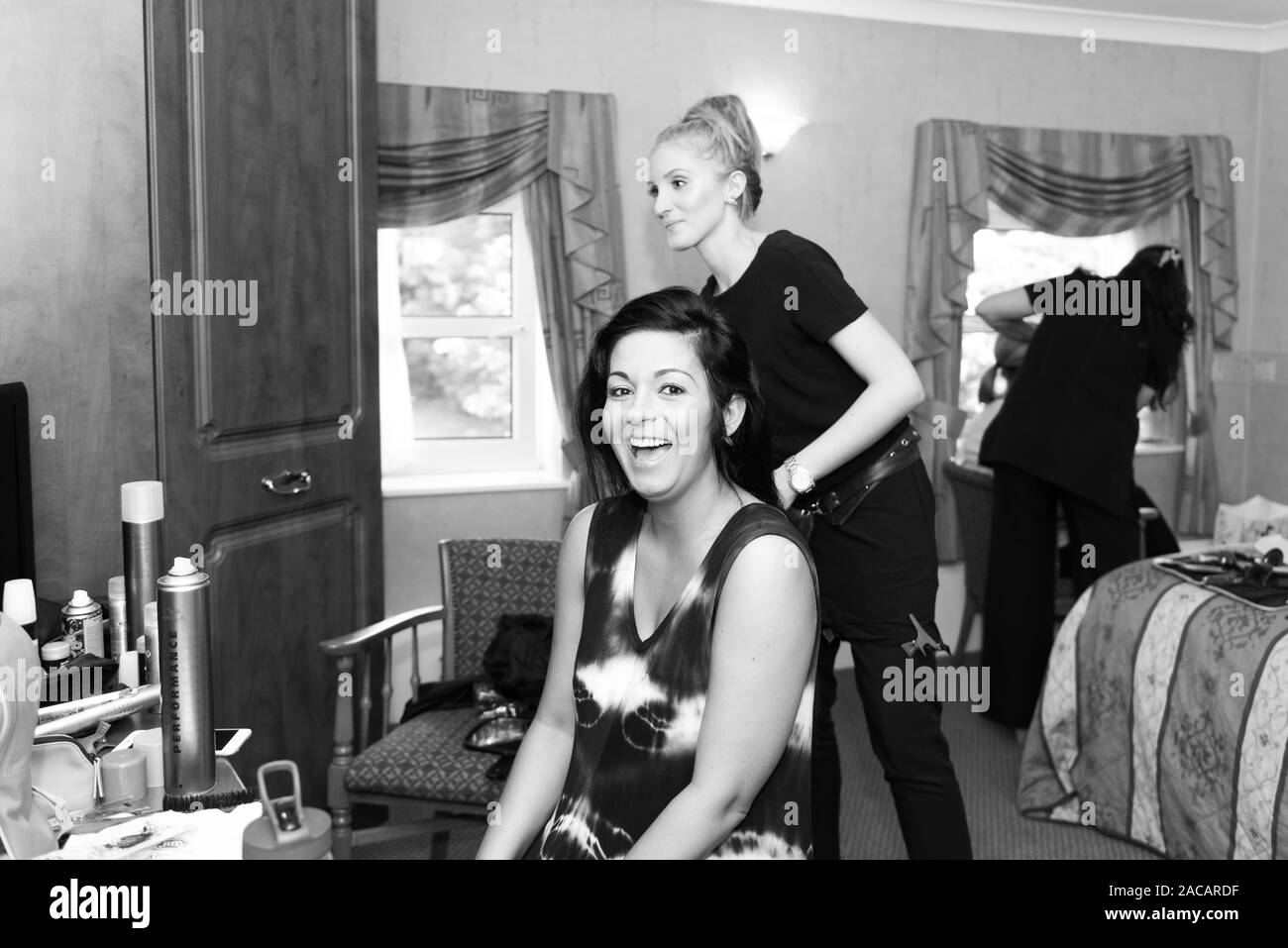 A beautiful bride to be getting ready during bridal prep, preparation ...