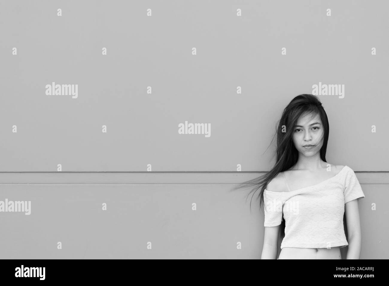 Vintage Woman Leaning Against Wall High Resolution Stock Photography ...