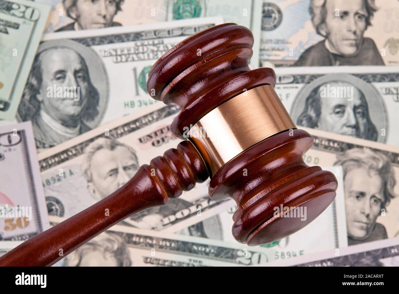 Dollar banknotes with gavel. Legal costs - Legal costs Stock Photo - Alamy