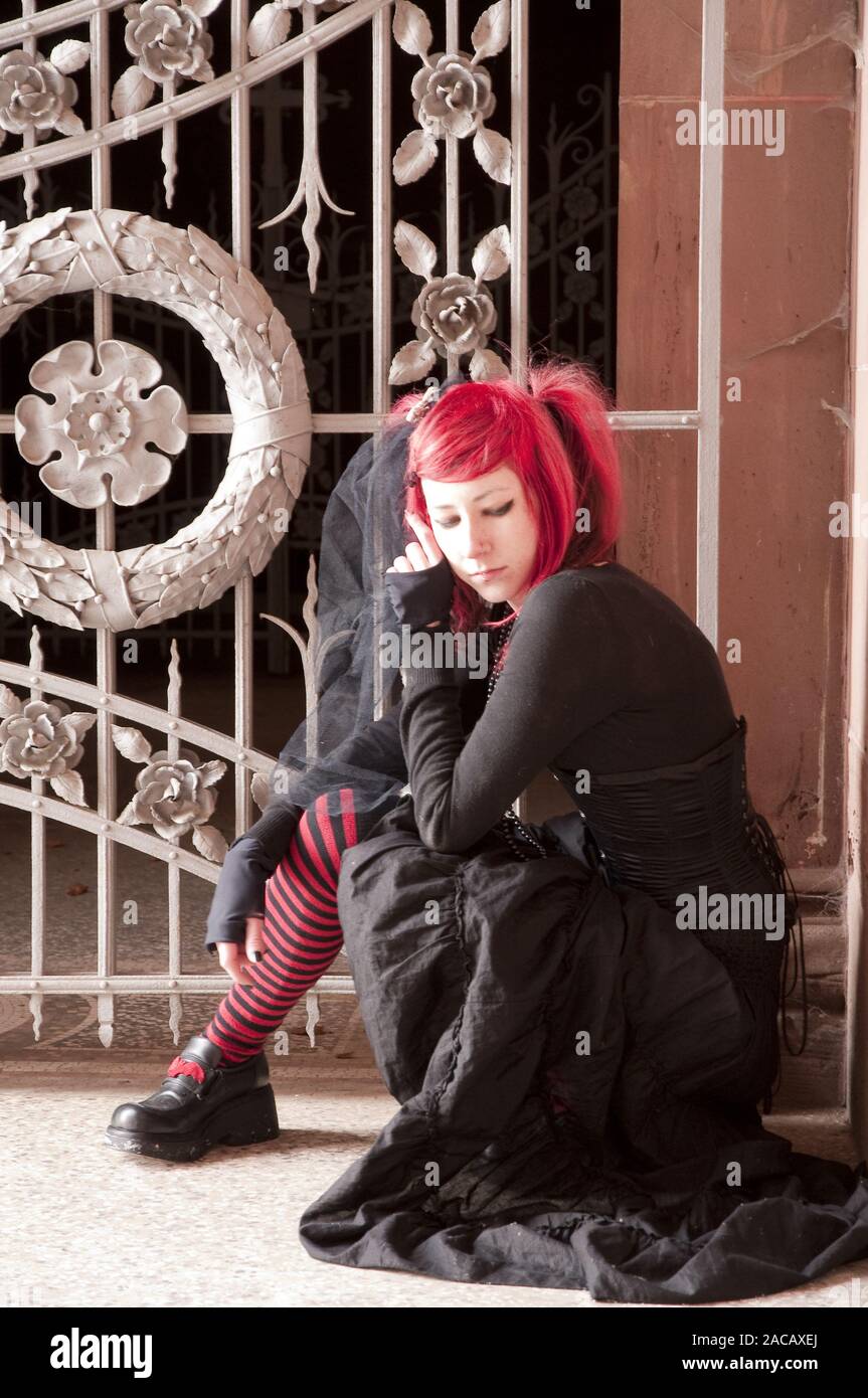 Young woman, widow on cemetery (Gothic Stock Photo - Alamy