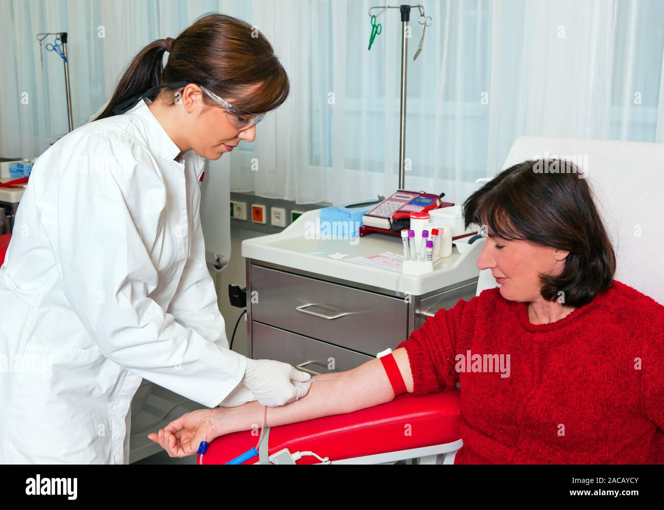 Blood collection during blood donation in a blood laboratory Stock ...