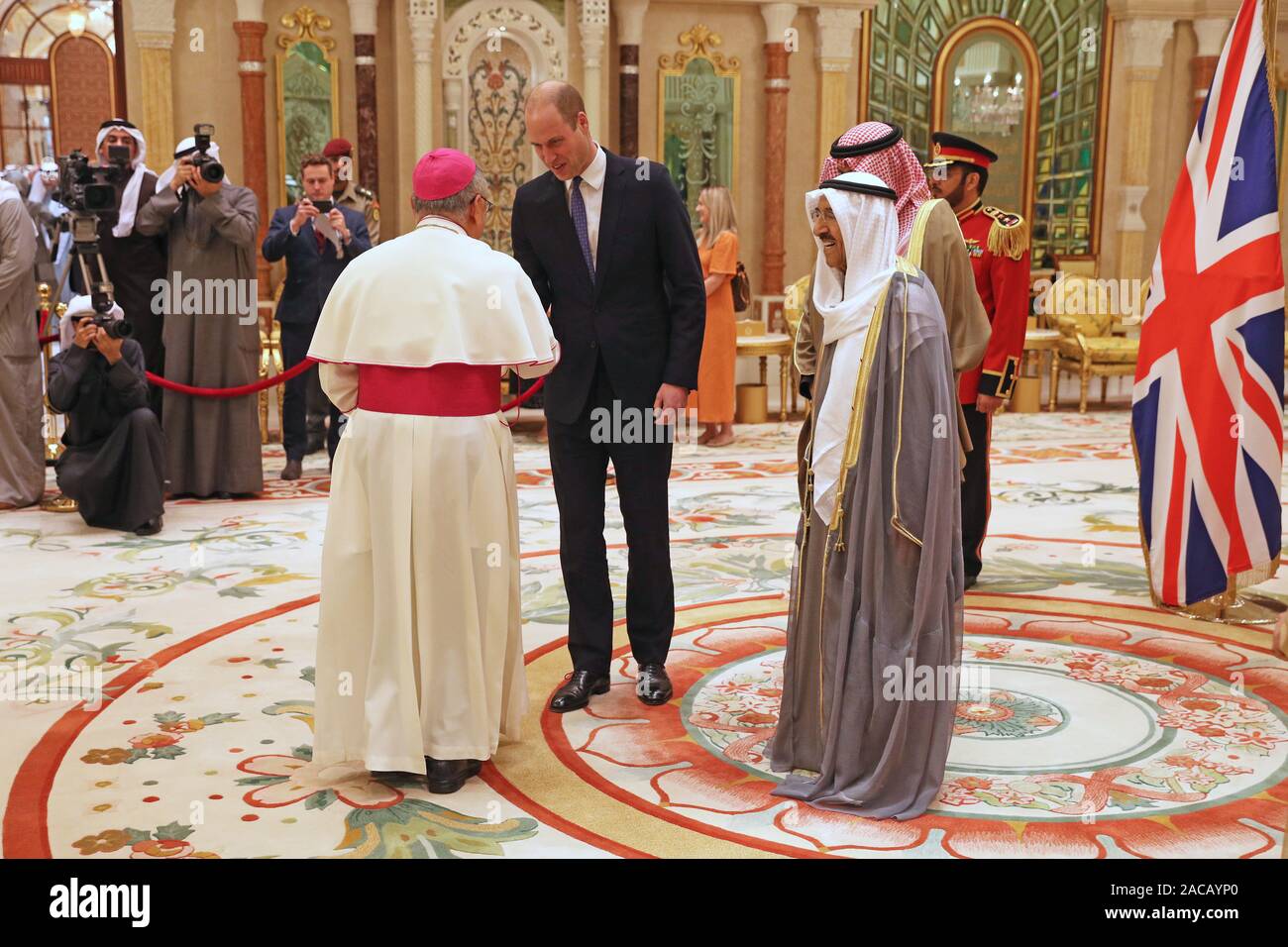 The Duke of Cambridge greets guests ahead of a luncheon with the Amir ...
