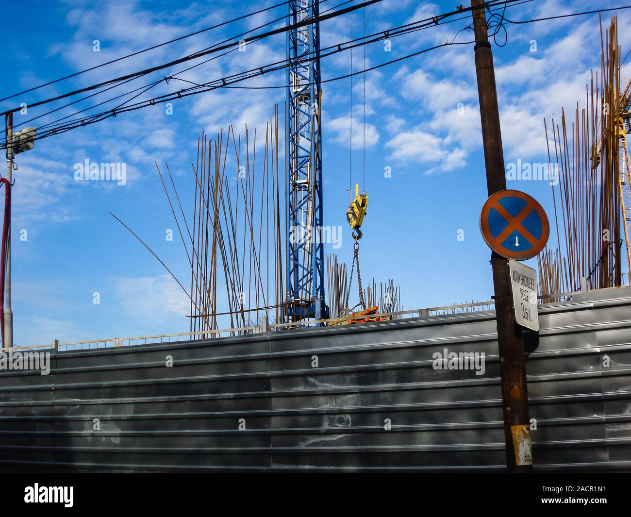 Large construction site including several cranes working on a building ...