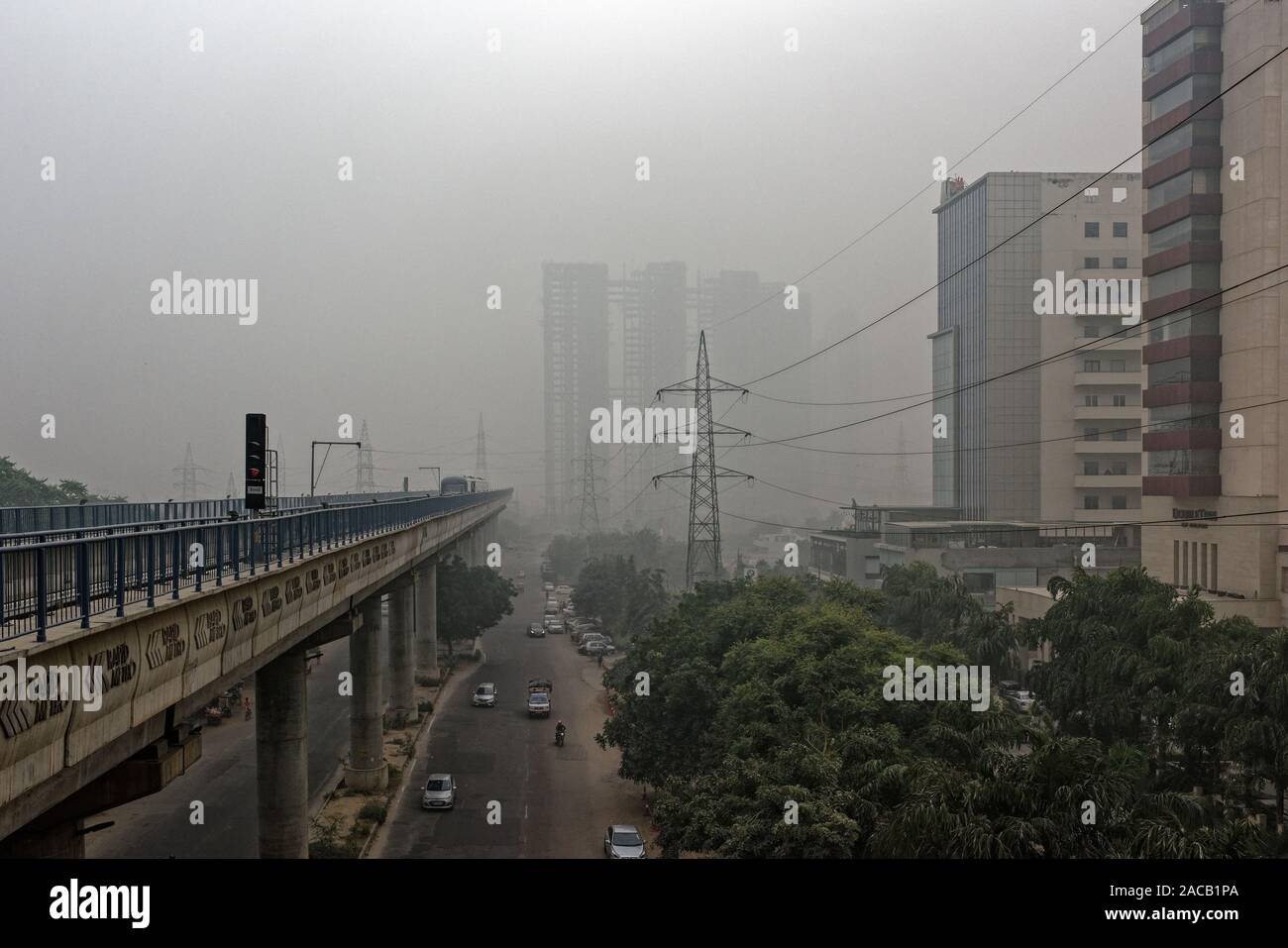 The rapid metro track fading into the smog of Delhi outside the Hilton ...