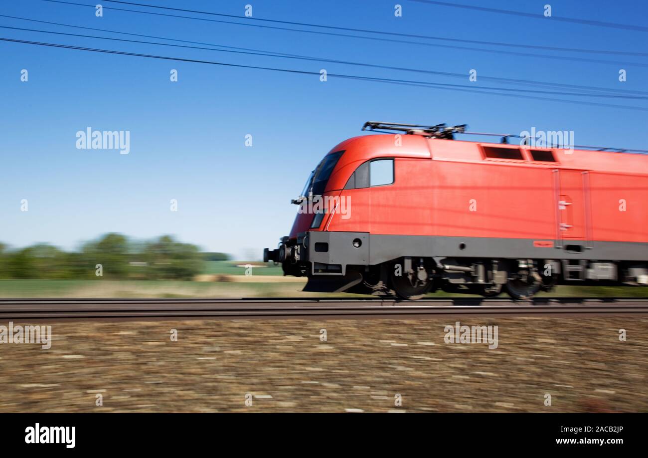Train on railway tracks Stock Photo - Alamy