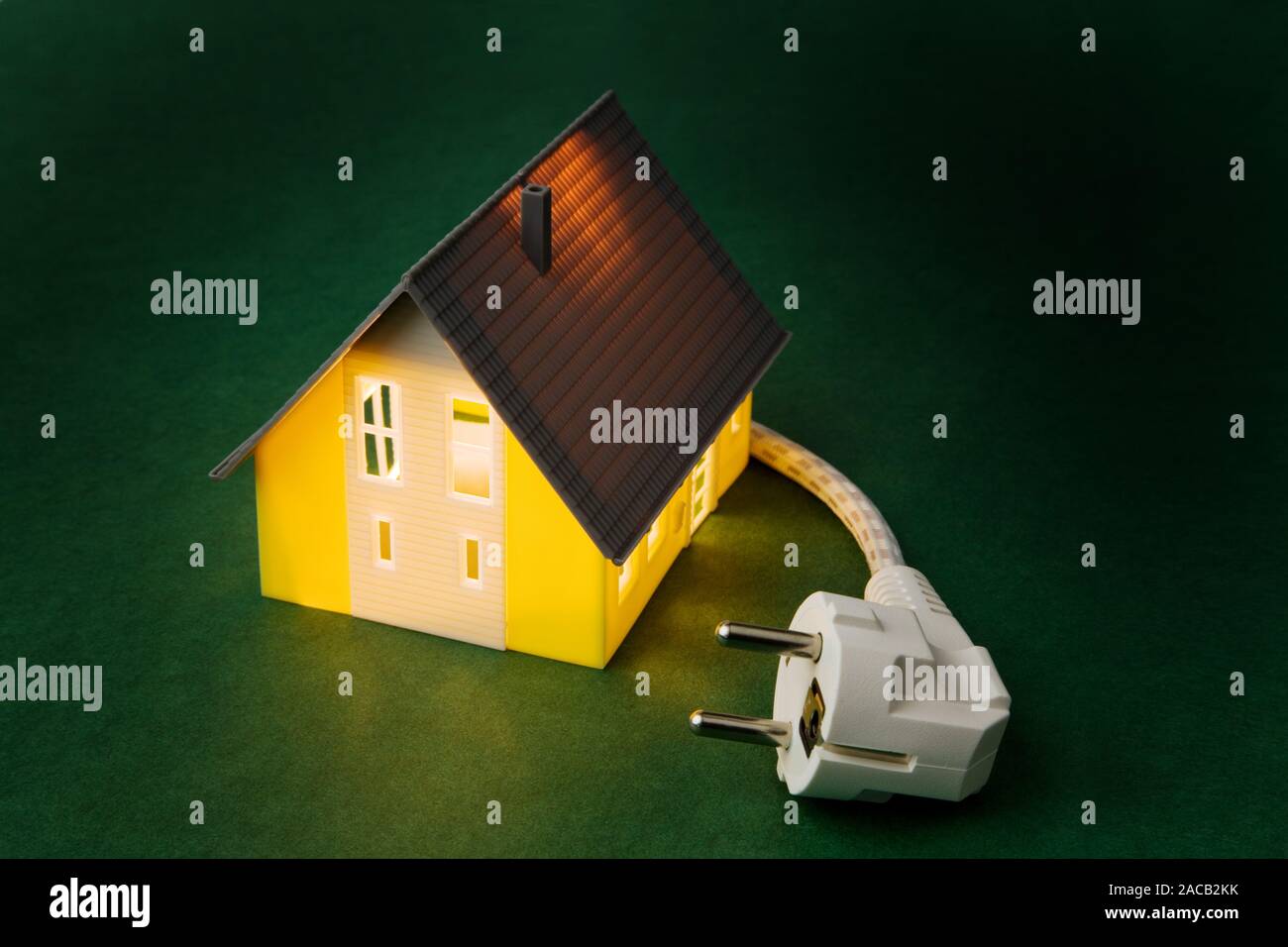 a house with power plug Stock Photo - Alamy