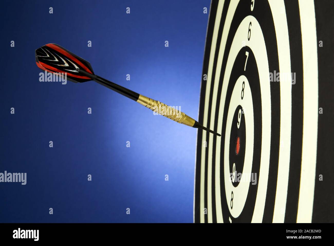 Arrow game with throwing arrow Stock Photo - Alamy