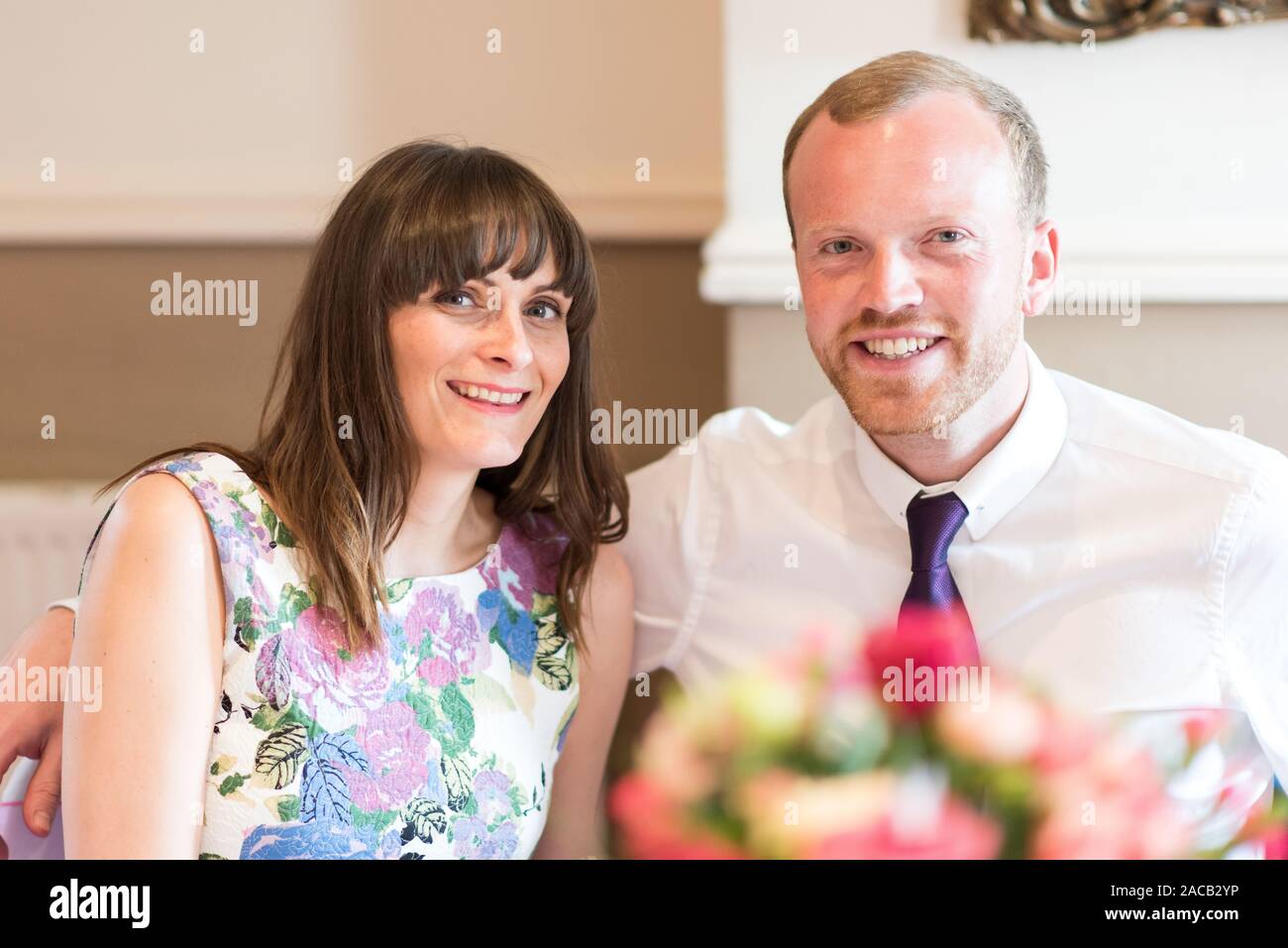 Wedding guests smiling, laughing and having fun at the wedding ...