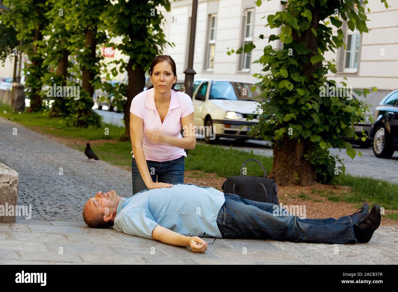 Cardiac massage. First aid for myocardial infarction Stock Photo - Alamy